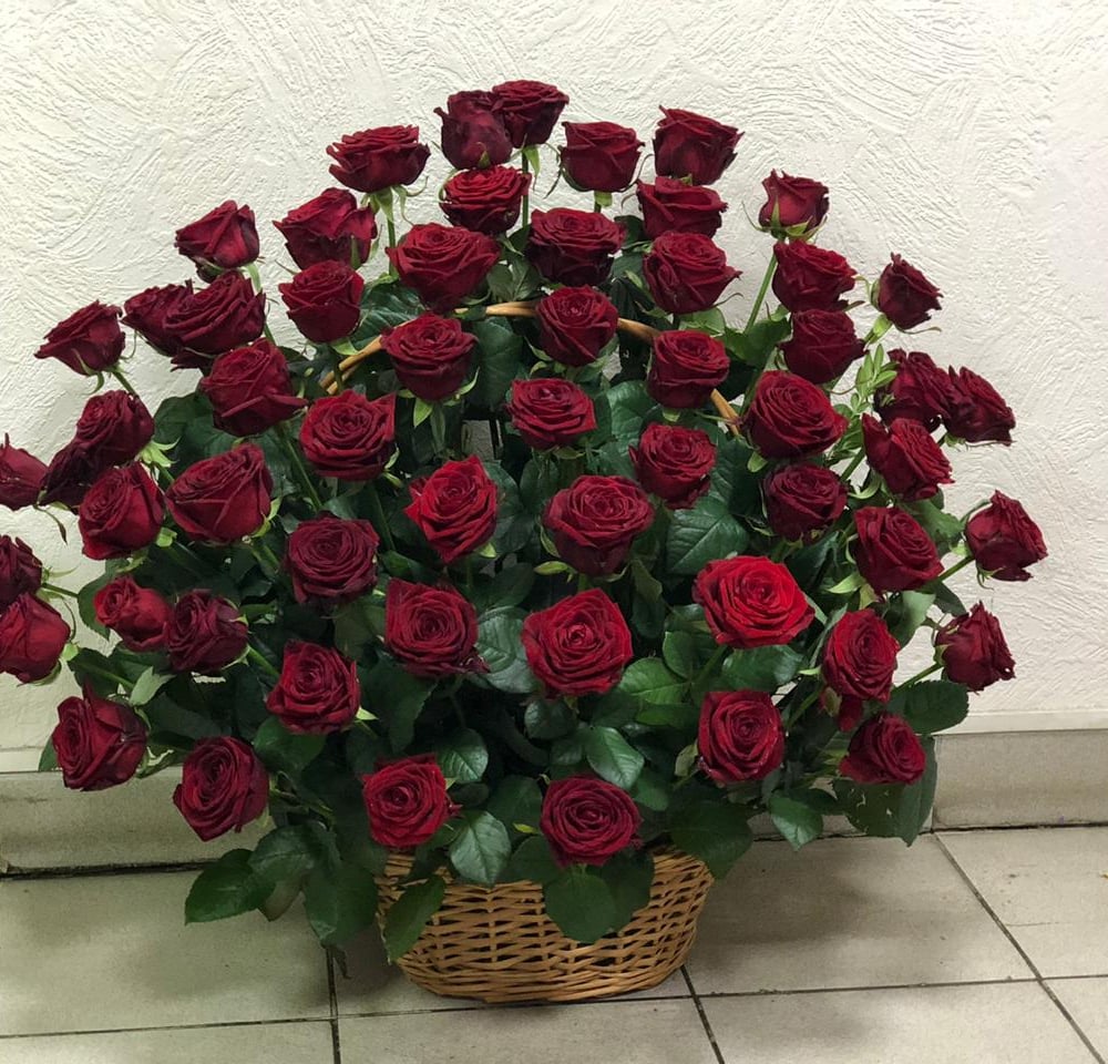Funeral basket of red roses