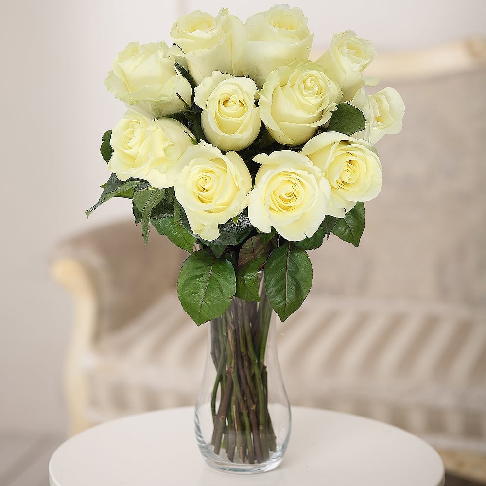 A bouquet of 11 white roses Flowers | Flower Delivery