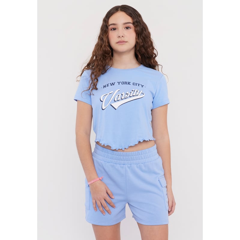 CORONA Polera Niña Teen Fun Roullette Azul Corona | falabella.com