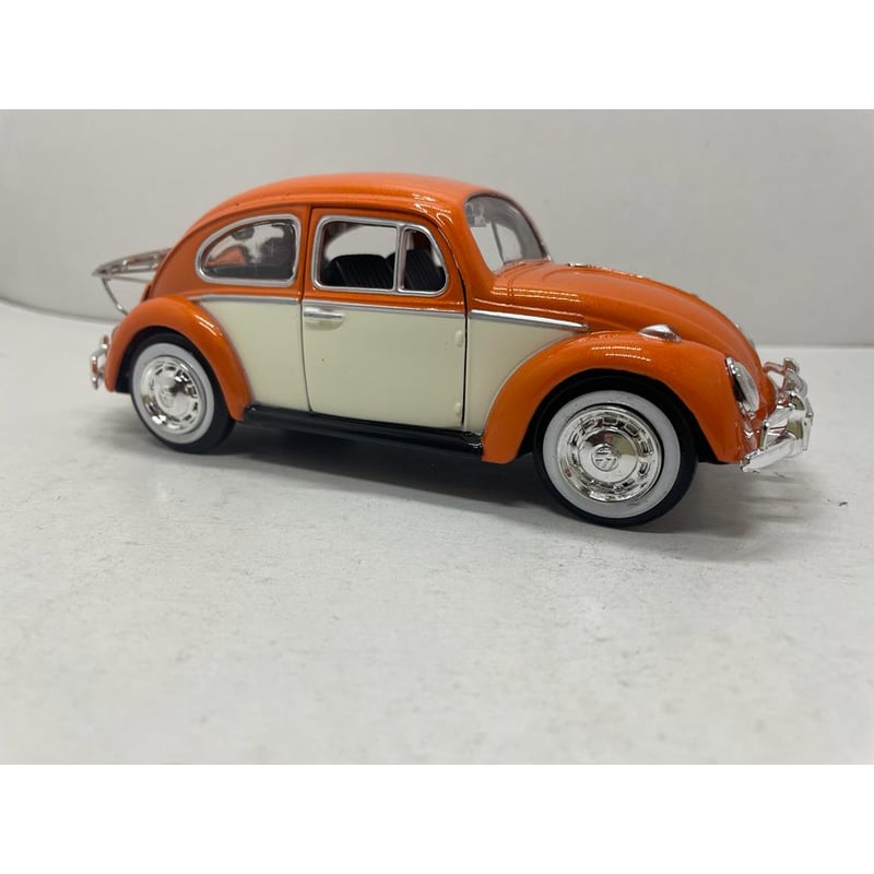 CARRO VOLKSWAGEN BEETLE NARANJA 1966 a Escala 1:24 MOTORMAX | falabella.com