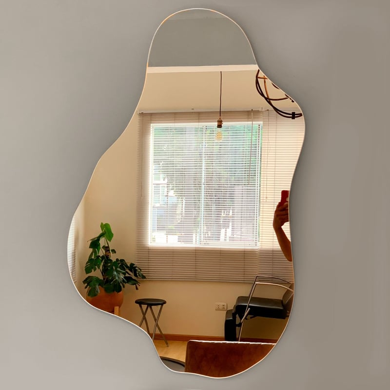 Espejo curvo SILUET con acabado pulido 100X63CM GENERICO | falabella.com