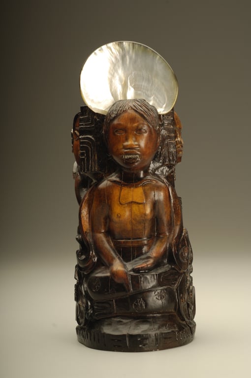 Idol with a Shell by Paul Gauguin