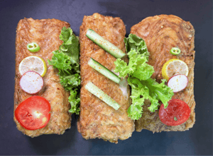 Find delicious smoky Chapli Kabab and Fish delights at Khan Chapli Kabab