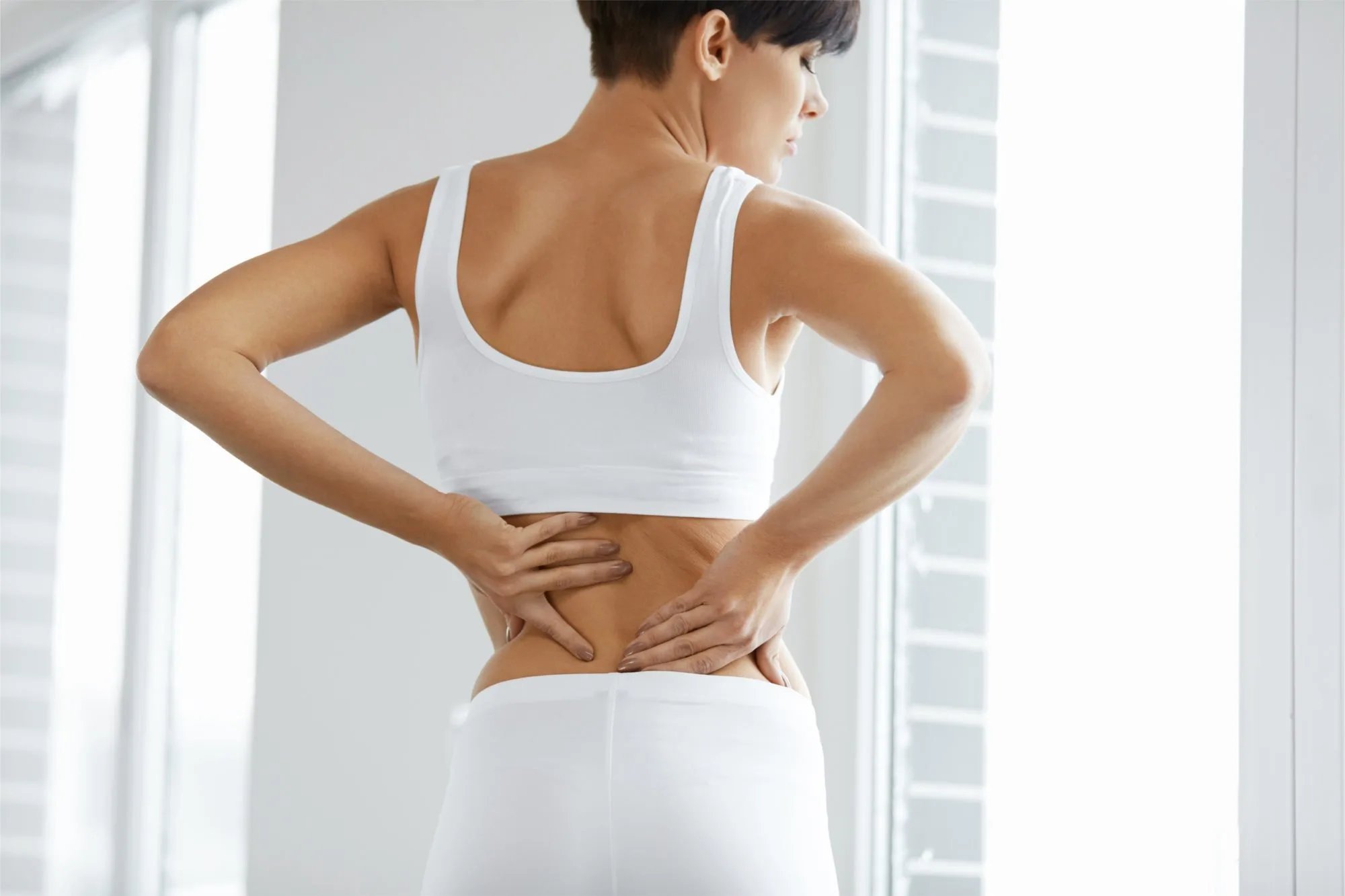 Tips to Reduce Lower Back Pain During Periods - Longevity LIVE