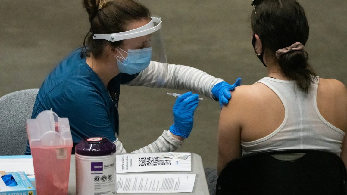 COVID vaccines still protect against heart problems, large study finds ...