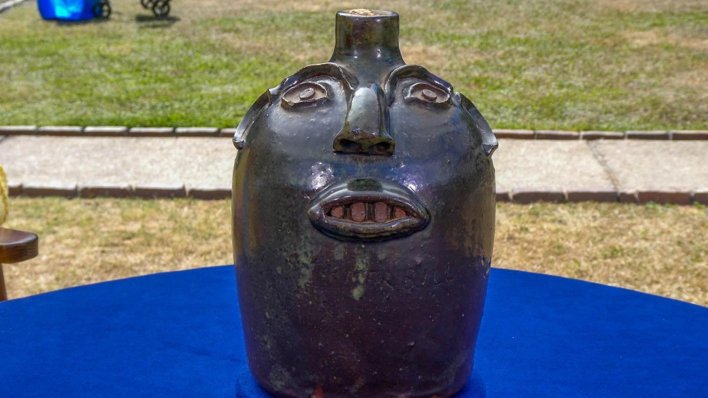 Appraisal: Davis Pennington Brown Stoneware Face Jug, ca. 1917 – WABE