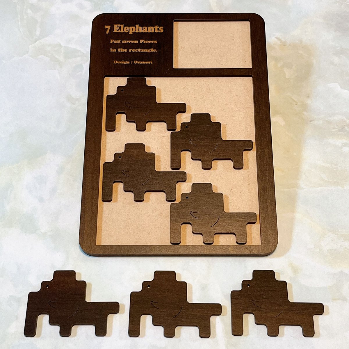 7 Elephants | Puzzle Design
