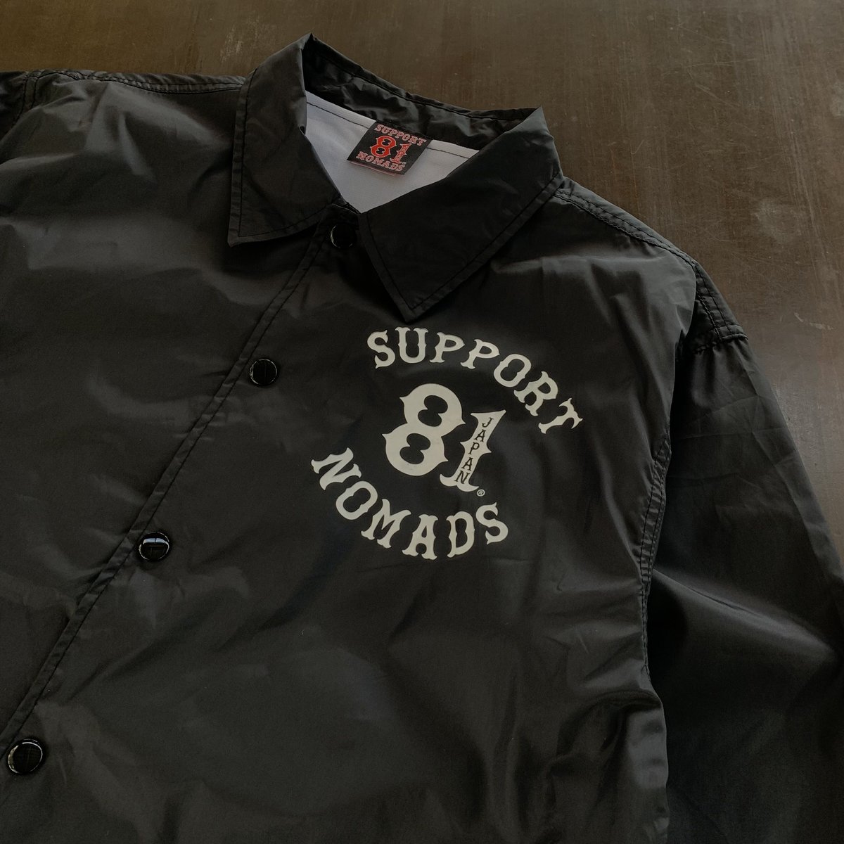 SUPPORT 81 NOMADS JAPAN_ COACH JKT_Black/White...
