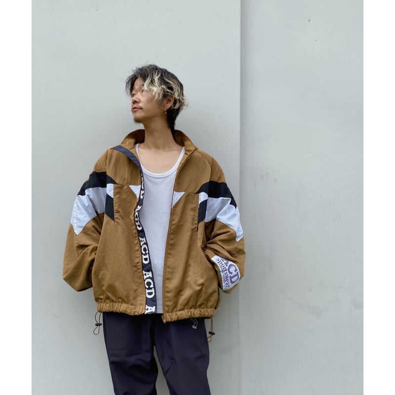 BLACK WEIRDOS「Nylon Track JKT(Motocross)」brown. BLACK WEIRDOS「Nylon Track JKT(Motocross)」brown.