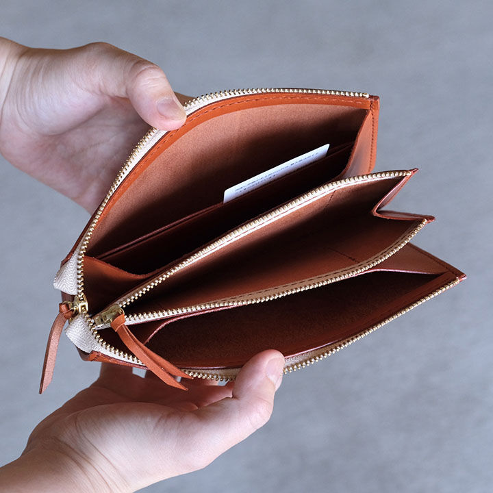 【在庫お問合せください】RHYTHMOS（リュトモス） "Zip(L) / 財布" | soup.