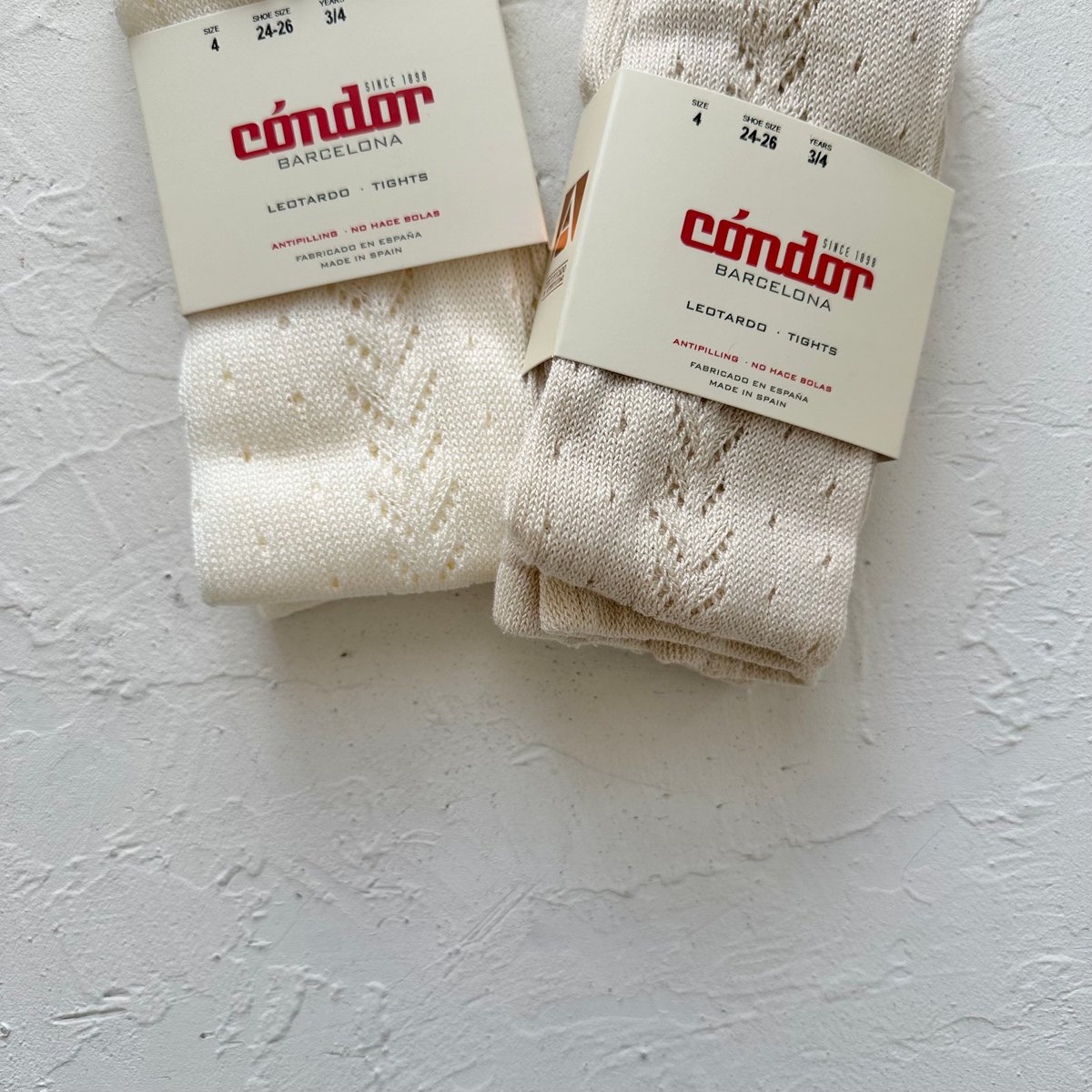 condor / Perle openwork tights with front dots...