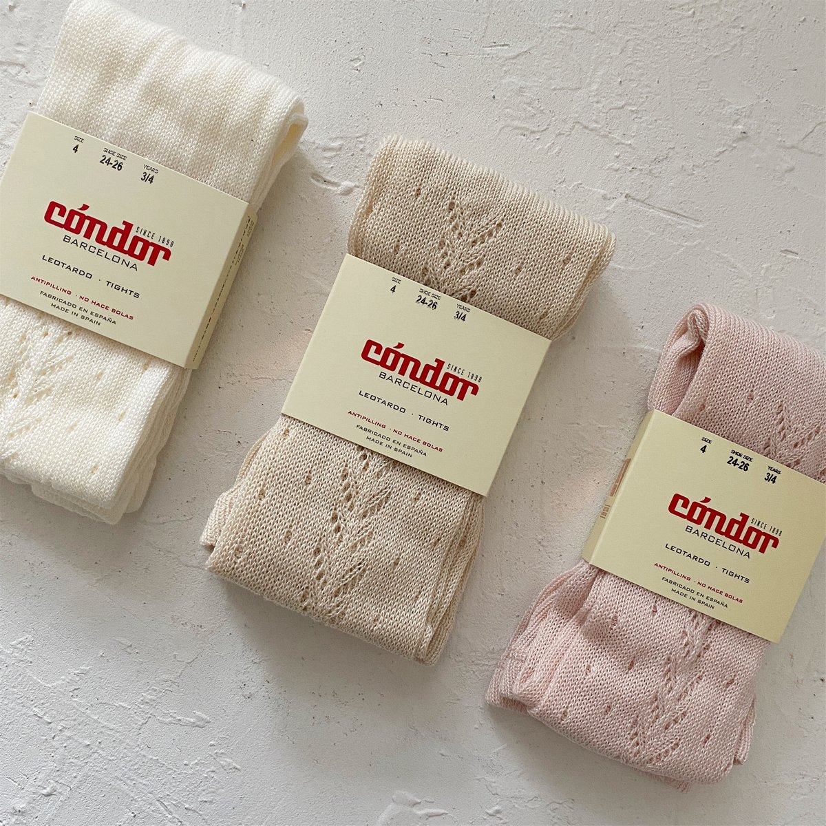 condor / Perle openwork tights with front dots...