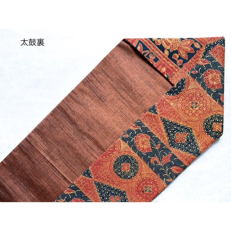 ジャワ更紗 九寸名古屋帯 赤丹に花と幾何学(仕立て上り ジャワ更紗 九寸名古屋帯 赤丹に花と幾何学(仕立て上り