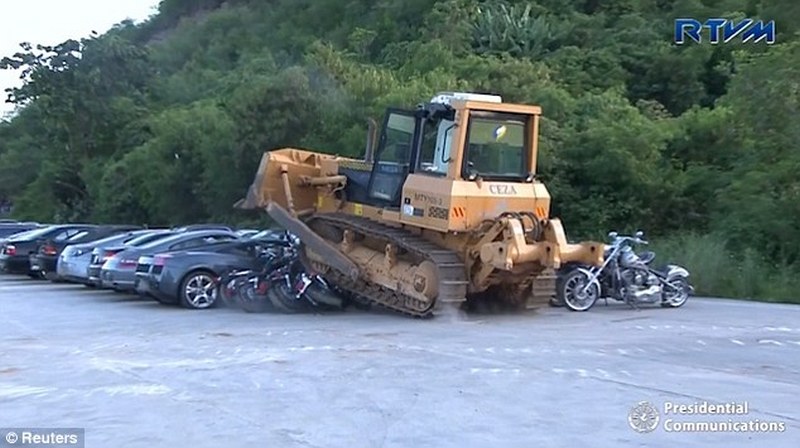 Porsche's Lamborghini's and more - Watch a bulldozer destroy 68 luxury ...