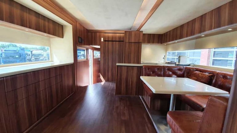 A commodious living room, three posh bedrooms, and a well-equipped ...