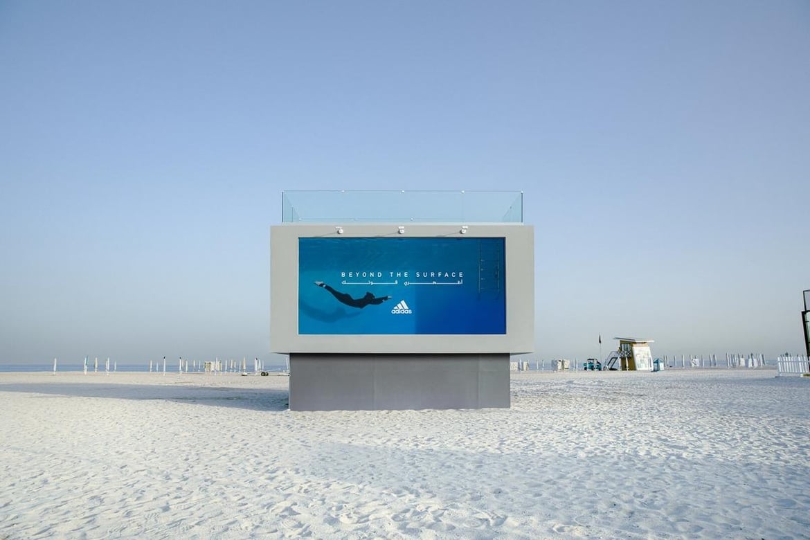 Adidas invites women to dive into its first liquid billboard in Dubai ...