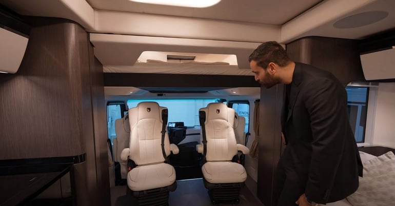 Complete with a full kitchen, bathroom, bedroom, and massaging seats ...