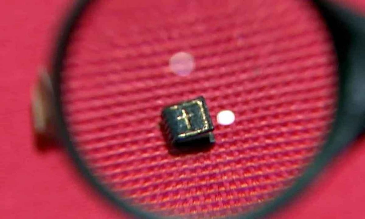 Tinnier than the head of a pencil, the world's smallest book was ...