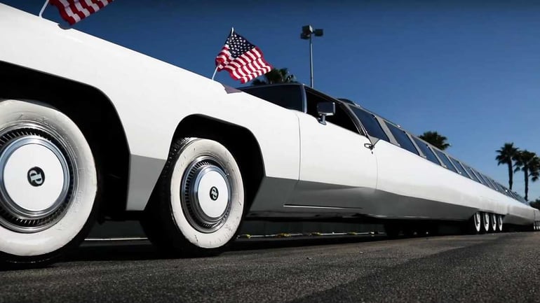 Its 100 feet long, has 26 wheels, a jacuzzi, a golf course, and even a ...