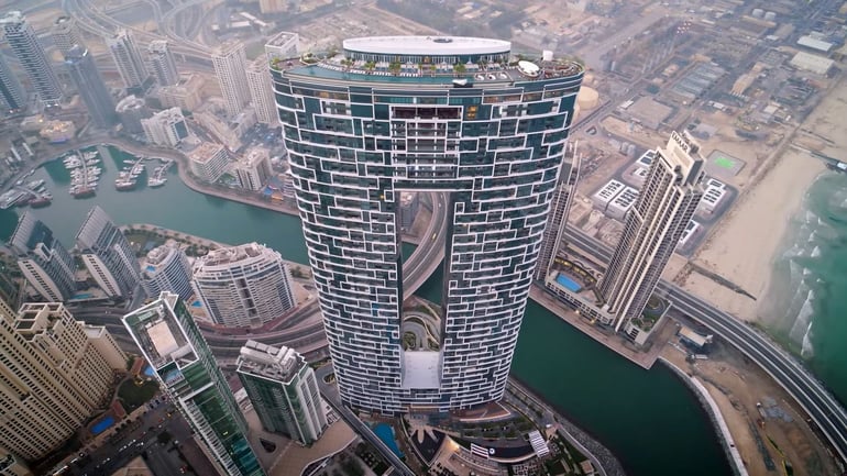 Clad in Prada, this daredevil wakeskated on the world's highest ...