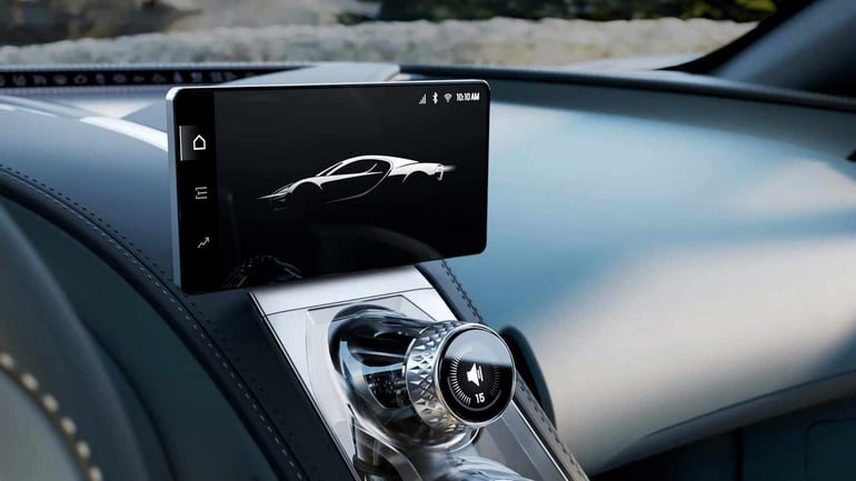 By using a mechanical watch-inspired analog gauge cluster instead of a ...