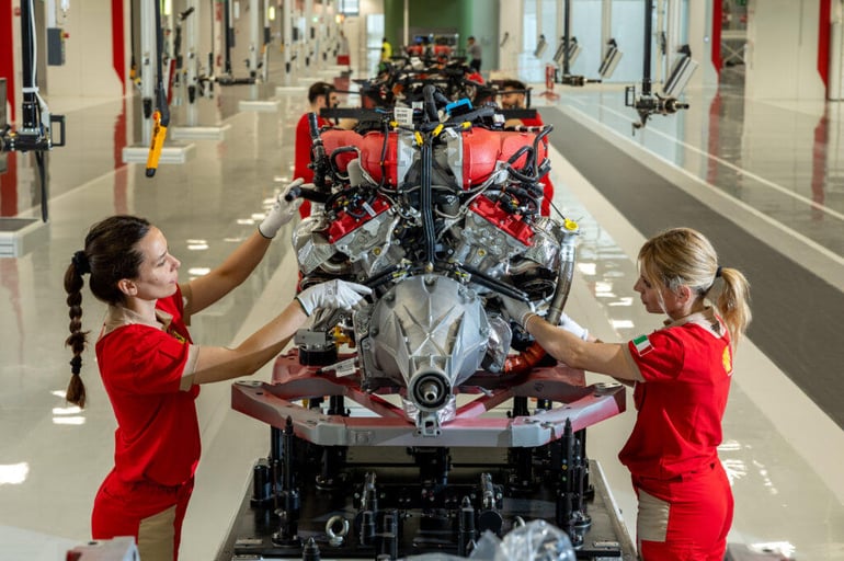 In the age of robotics and automation, Ferrari hand-paints its shield ...