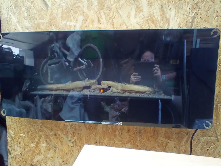 Wall mounted eletric fire used and working with remote for lights ...