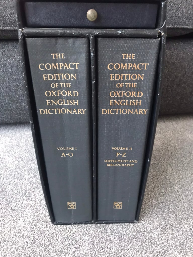 Compact Edition of the Oxford English Dictionary and magnifying glass ...