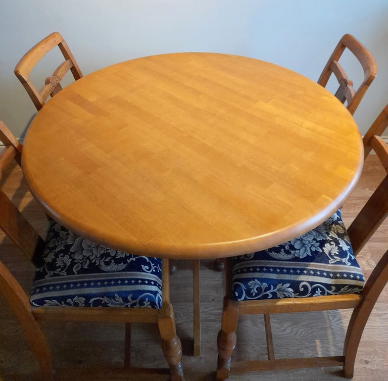 Solid wood pedestal dining table and 4 vintage varnished oak dining ...