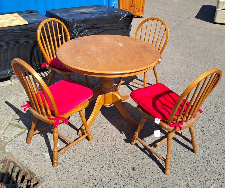 Round dining table and 4 chairs | in Exeter, Devon | Gumtree