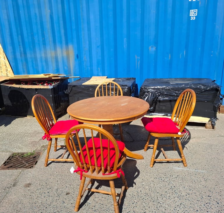 Round dining table and 4 chairs | in Exeter, Devon | Gumtree