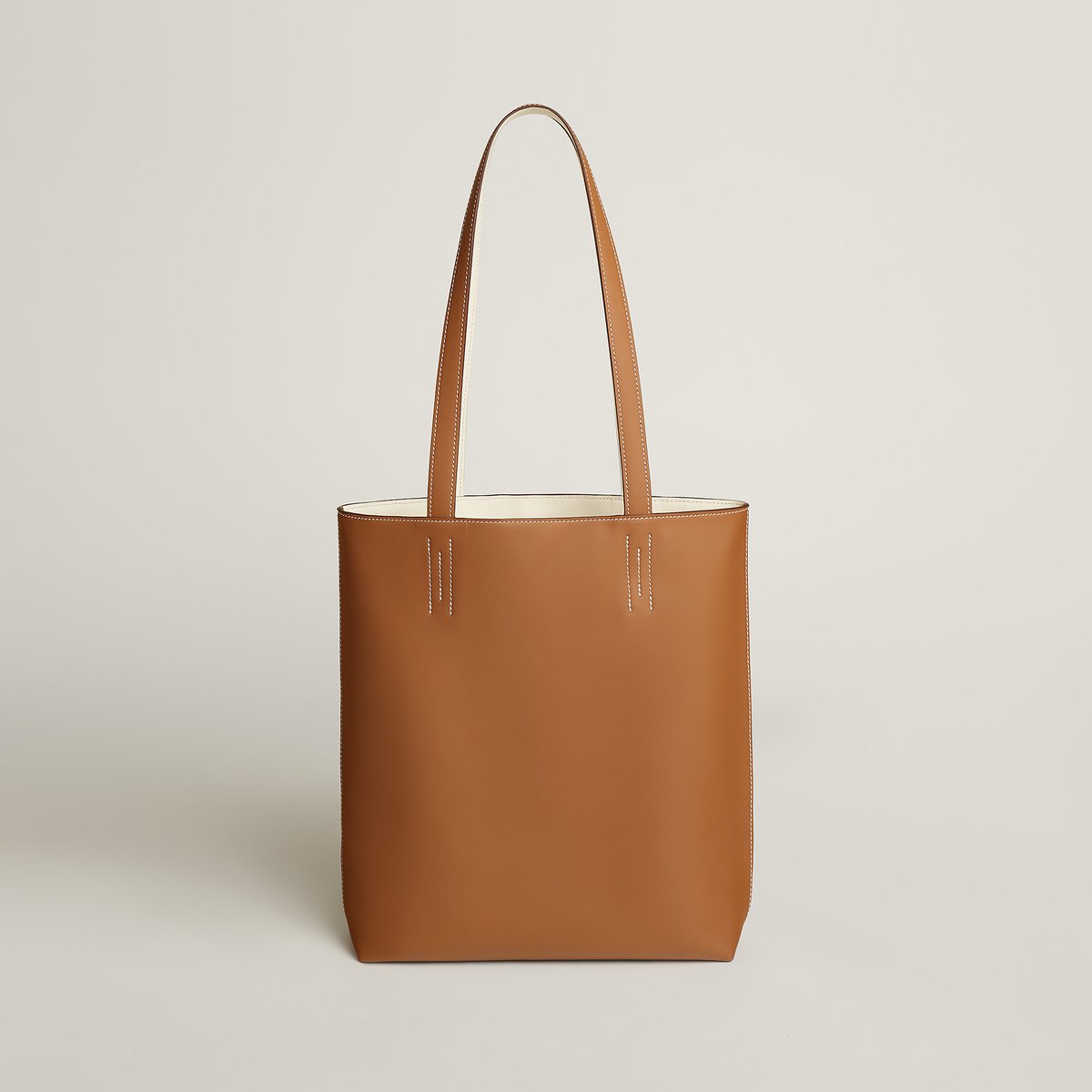 Hermès Neo Double Sens 35 bicolor bag Gold/nata Swift Calfskin | BagUSeek