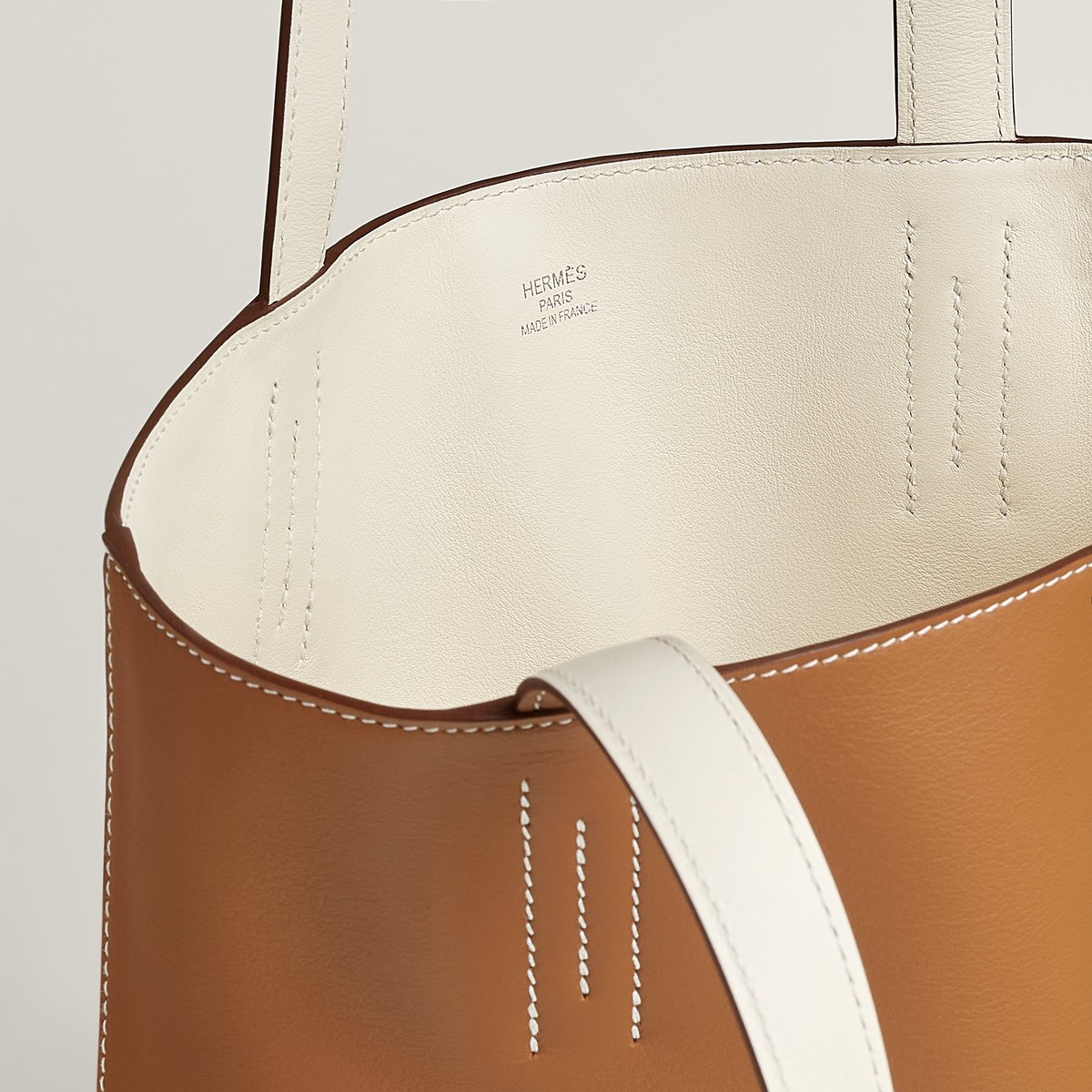 Hermès Neo Double Sens 35 bicolor bag Gold/nata Swift Calfskin | BagUSeek