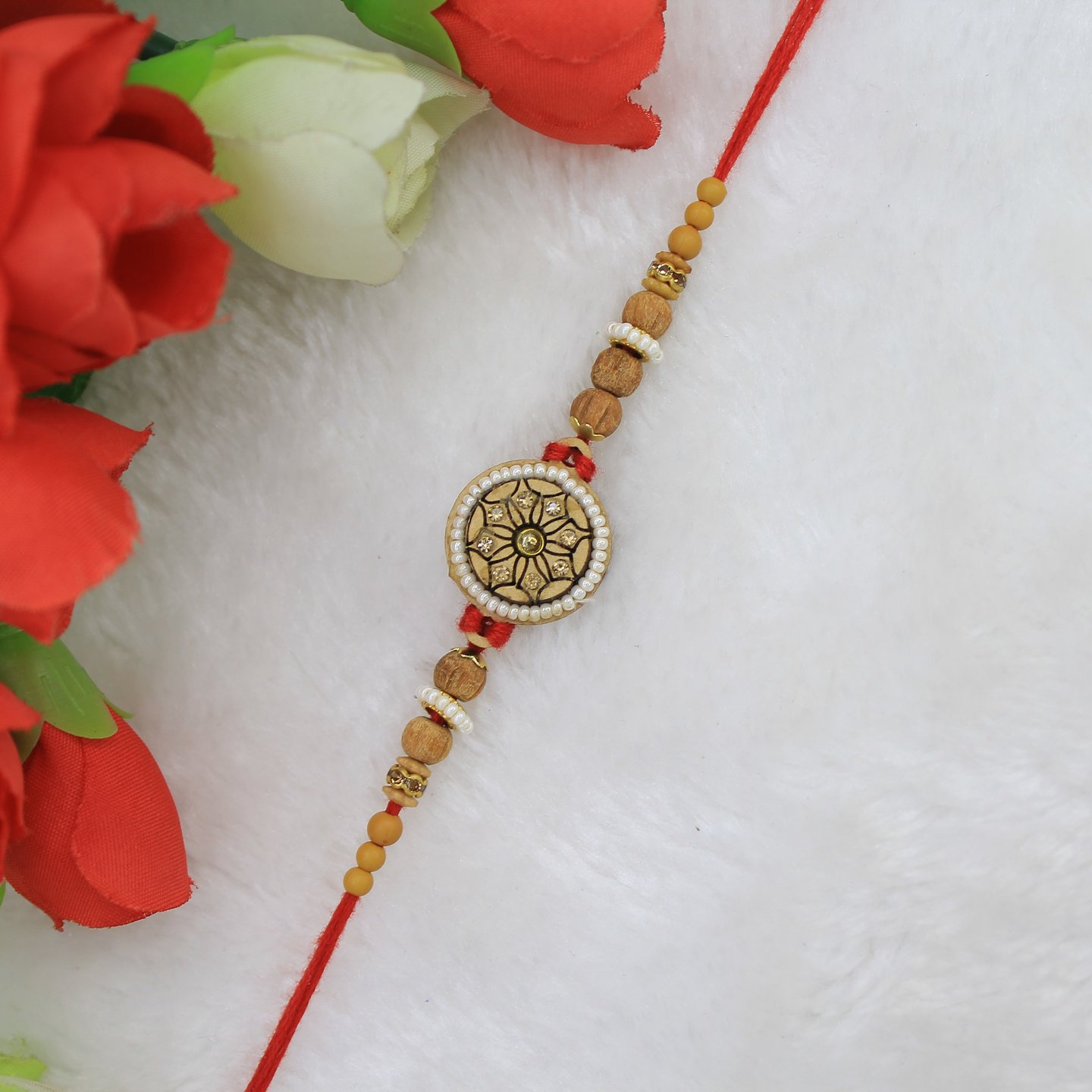 Buy Fragrance Chandan Rakhi with Chakra Design Online.