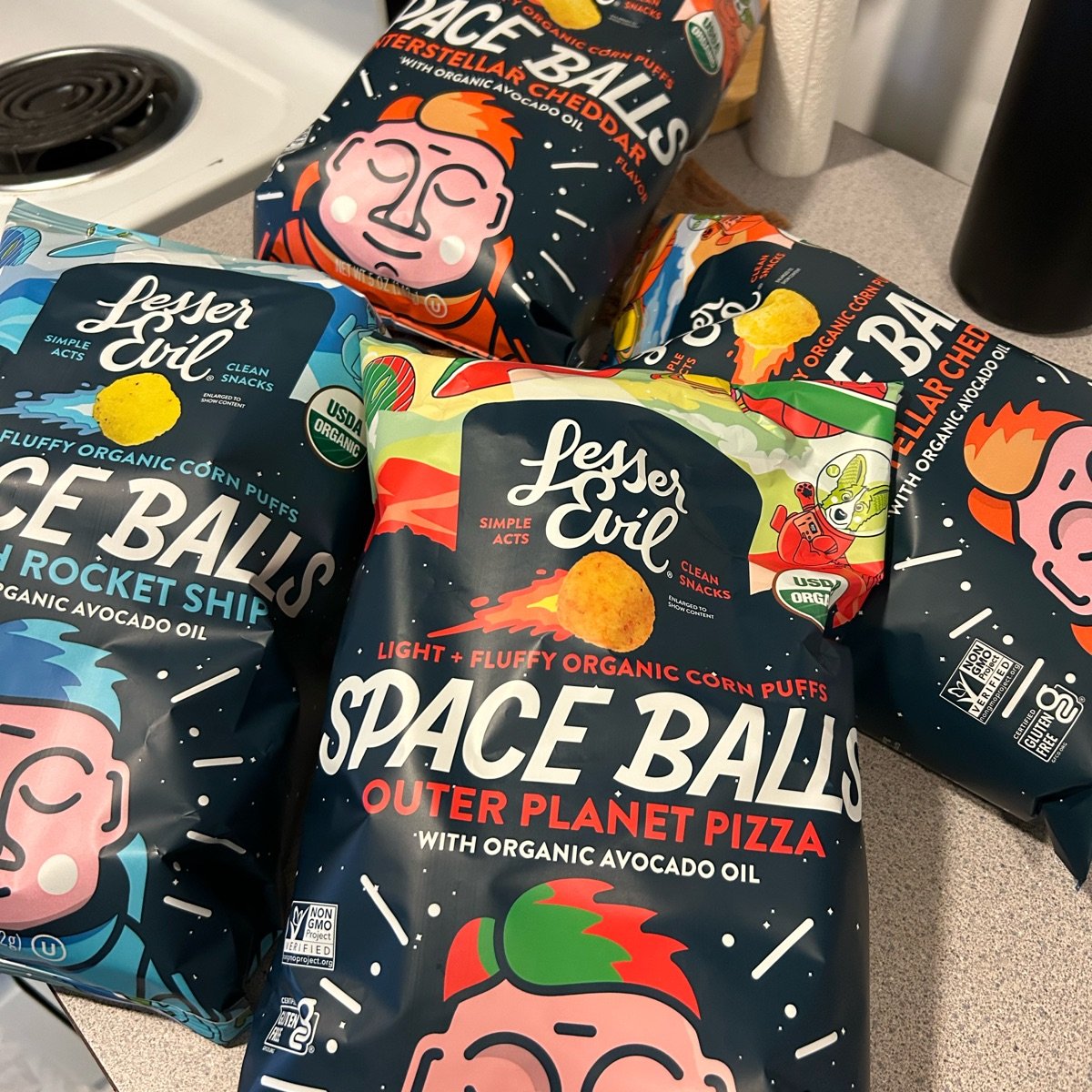 Outer Planet Pizza Corn Puffs from Lesser Evil Snacks - Vegan Product ...