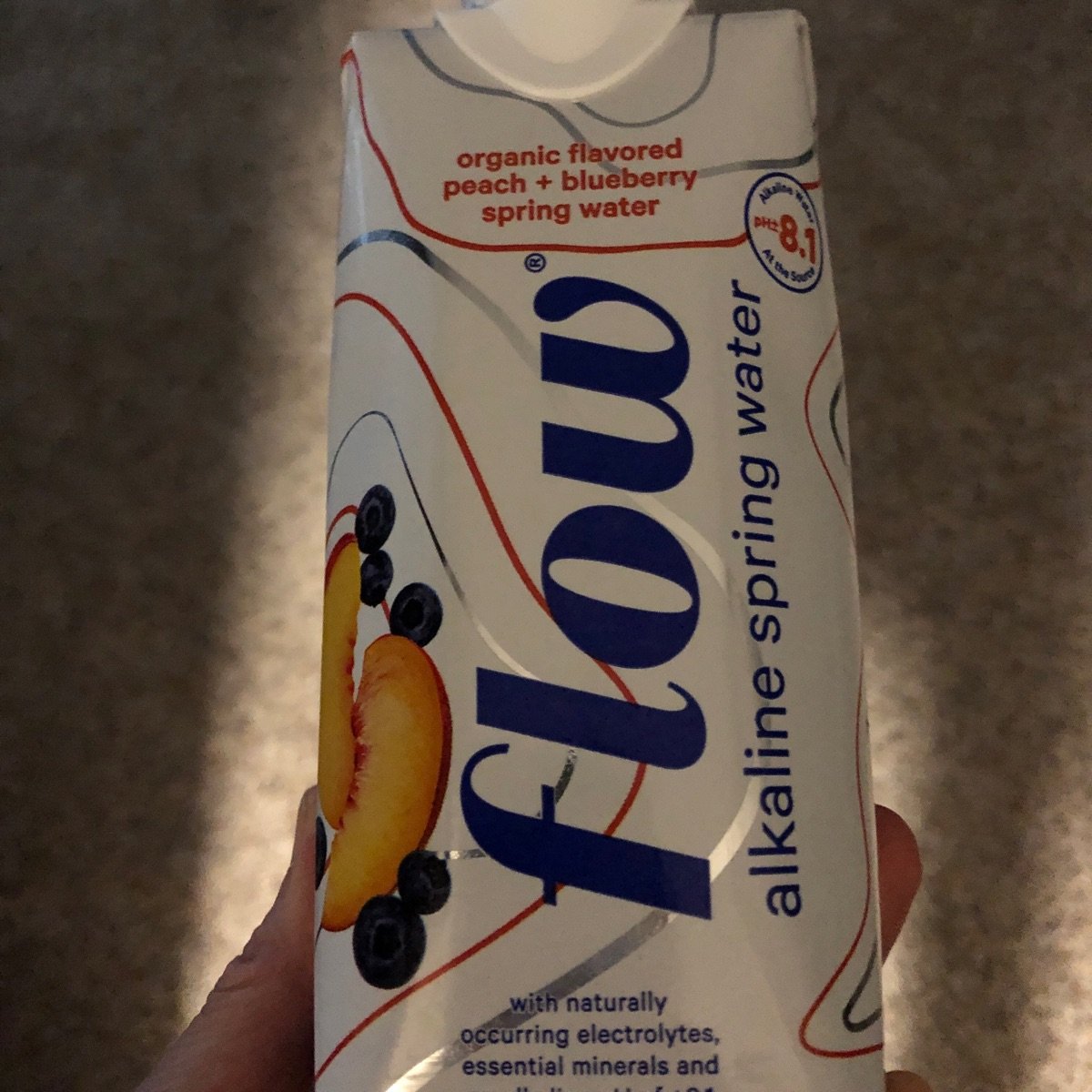 Organic flavored peach + blueberry spring water from Flow - Vegan ...