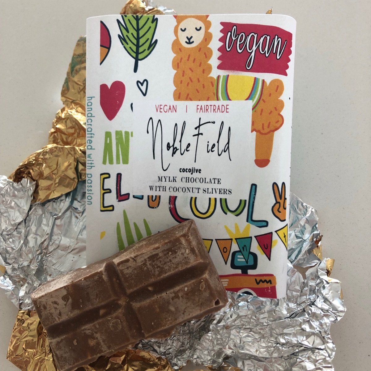 Milk chocolate with coconut slivers from Noble Field - Vegan Product ...