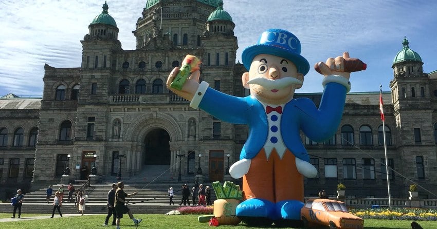 Gigantic monopoly man installed outside of Victoria's legislature buildings