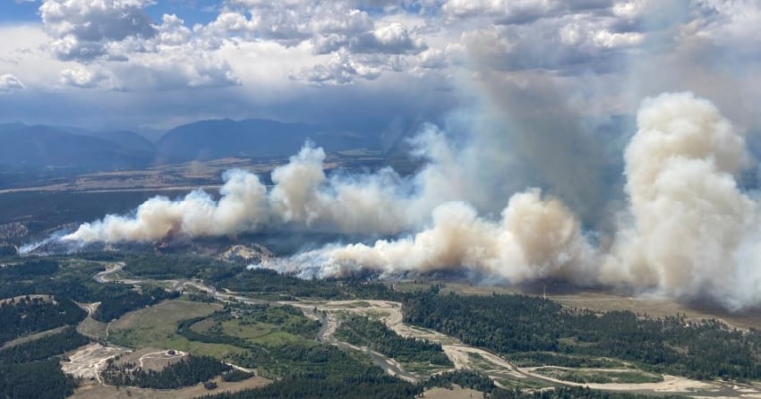 Multiple homes threatened by growing St. Mary's River fire near Cranbrook