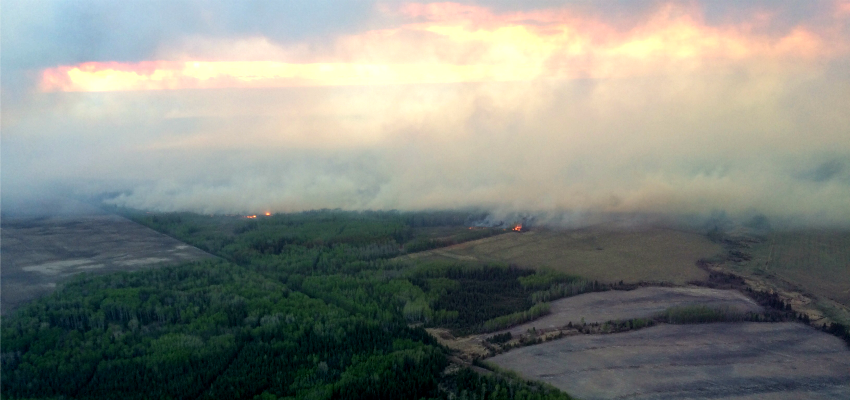 Peace River district declares state of emergency as two fires combine