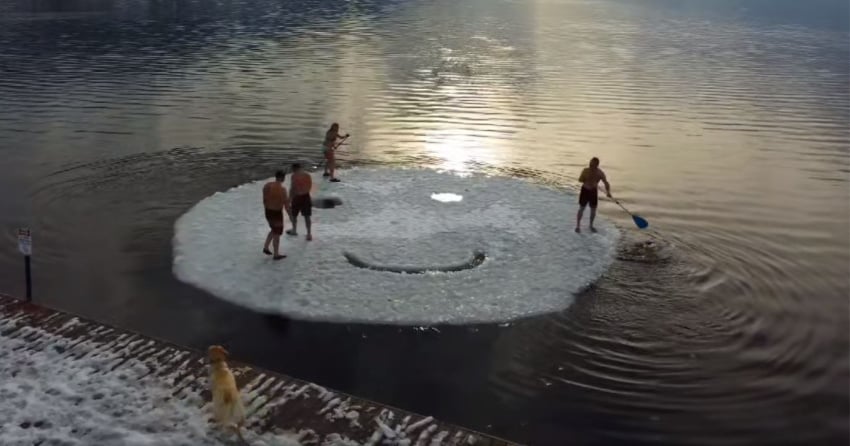 VIDEO: Brave souls carve smiley face in ice, set sail on Kalamalka Lake