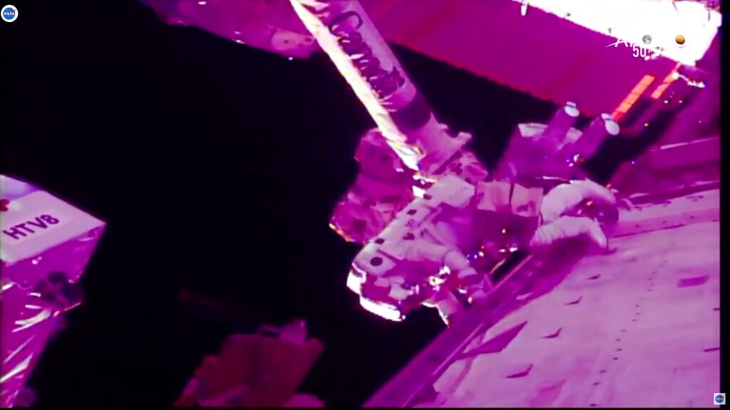 Spacewalking Astronauts Repairing Cosmic Ray Detector | Courthouse News ...