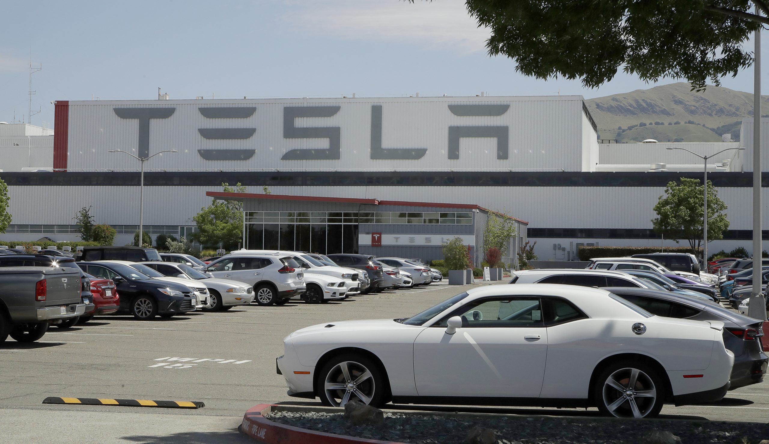 Tesla sued by Feds over allegations of racial harassment, retaliation ...