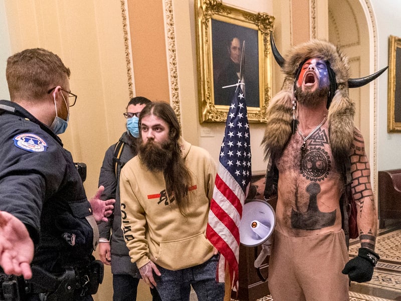 'QAnon Shaman' will spend over 3 years in prison for Capitol riot ...