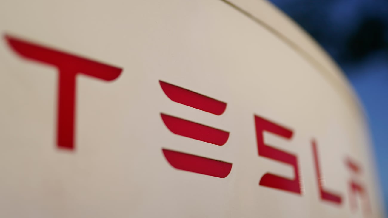 Tesla loses title as world's biggest electric vehicle maker as sales ...