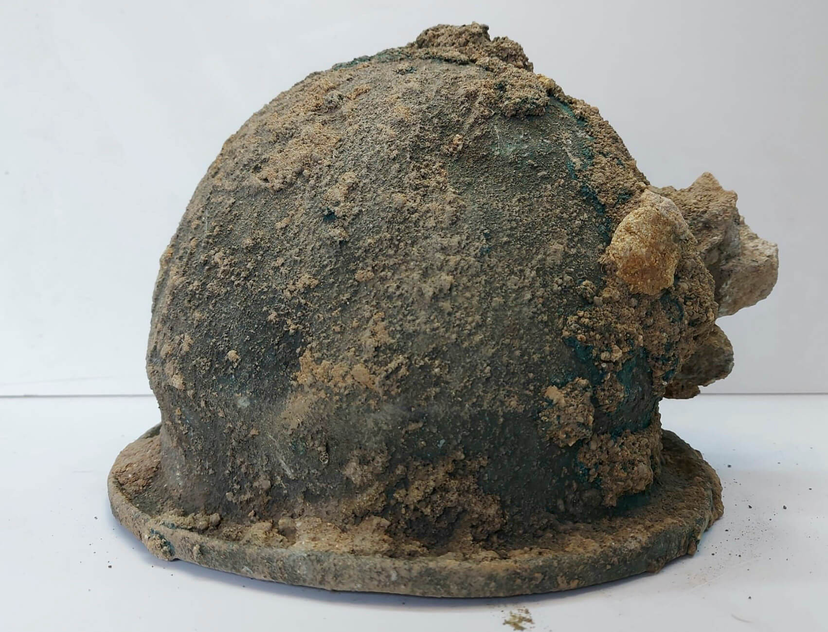 Ancient helmets, temple ruins found at dig in southern Italy ...