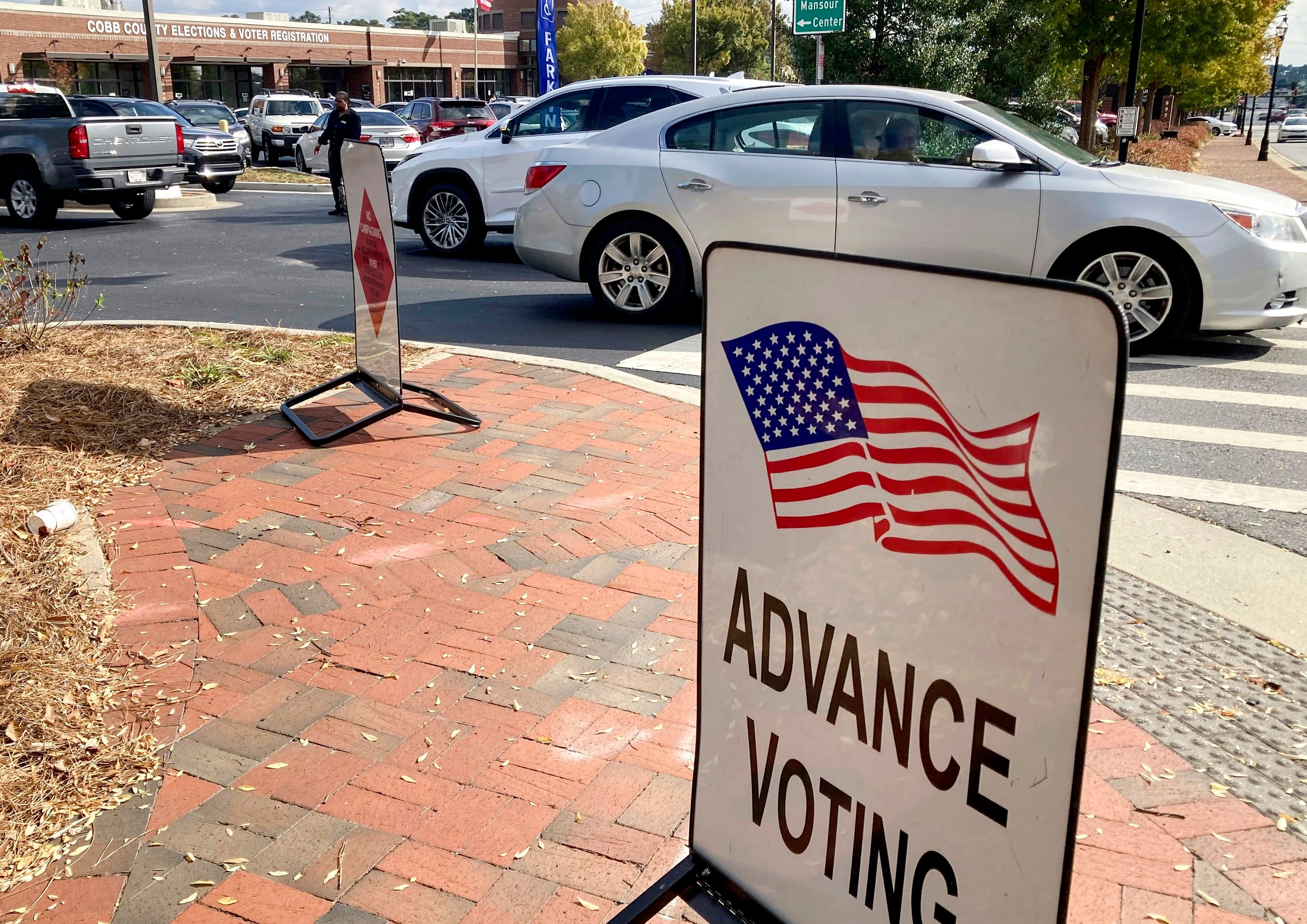 Judge temporarily blocks parts of Georgia voting law restrictions ...