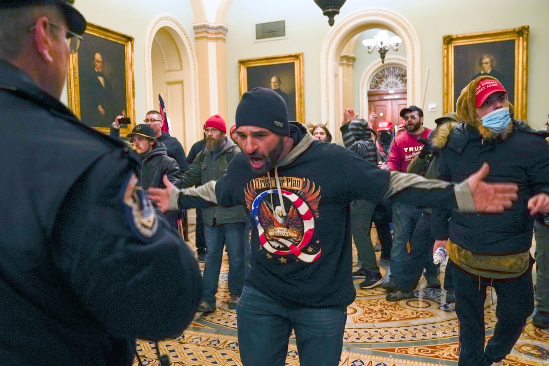 QAnon follower who chased officer on Jan. 6 gets 5 years | Courthouse ...