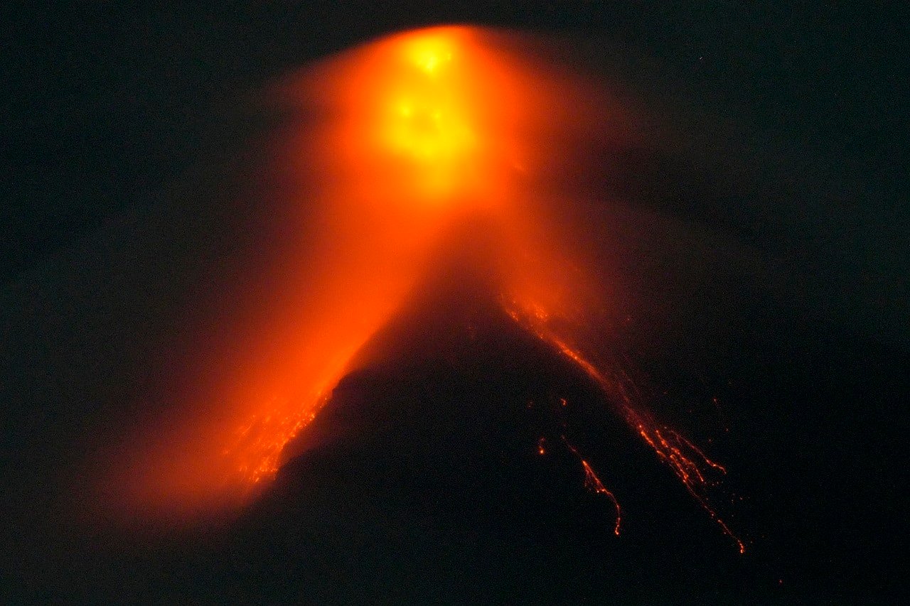 Most active Philippine volcano spews lava, locals ready to evacuate in ...