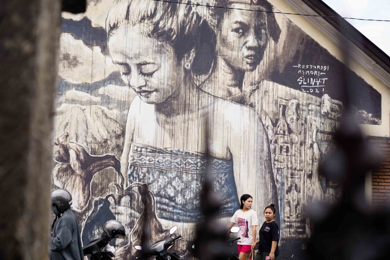 With dystopian street art, local artist questions Bali's 'exotic ...